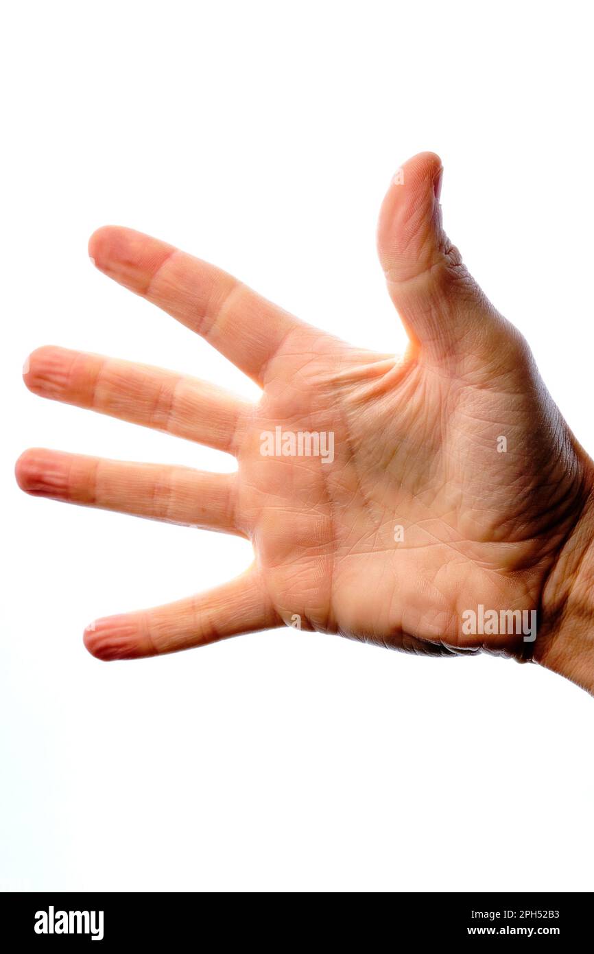 Close-up of a man's hand with all five fingers extended isolated on a ...