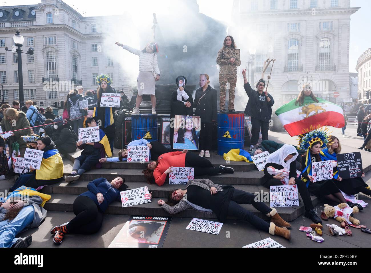 London, UK. 25 March, 2023. Ukrainian and Iranian women create a ...