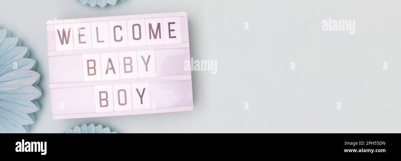 Welcome baby boy. Baby shower concept. Banner with lightbox with ...