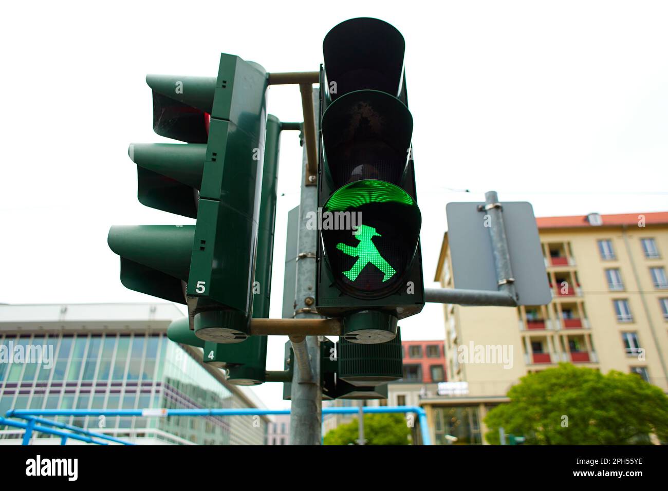 Traffic light for pedestrians with the figure of a walking man, lights ...