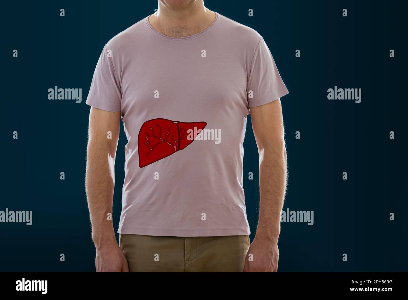 The man standing on a dark background with picture of a liver. Anatomy ...