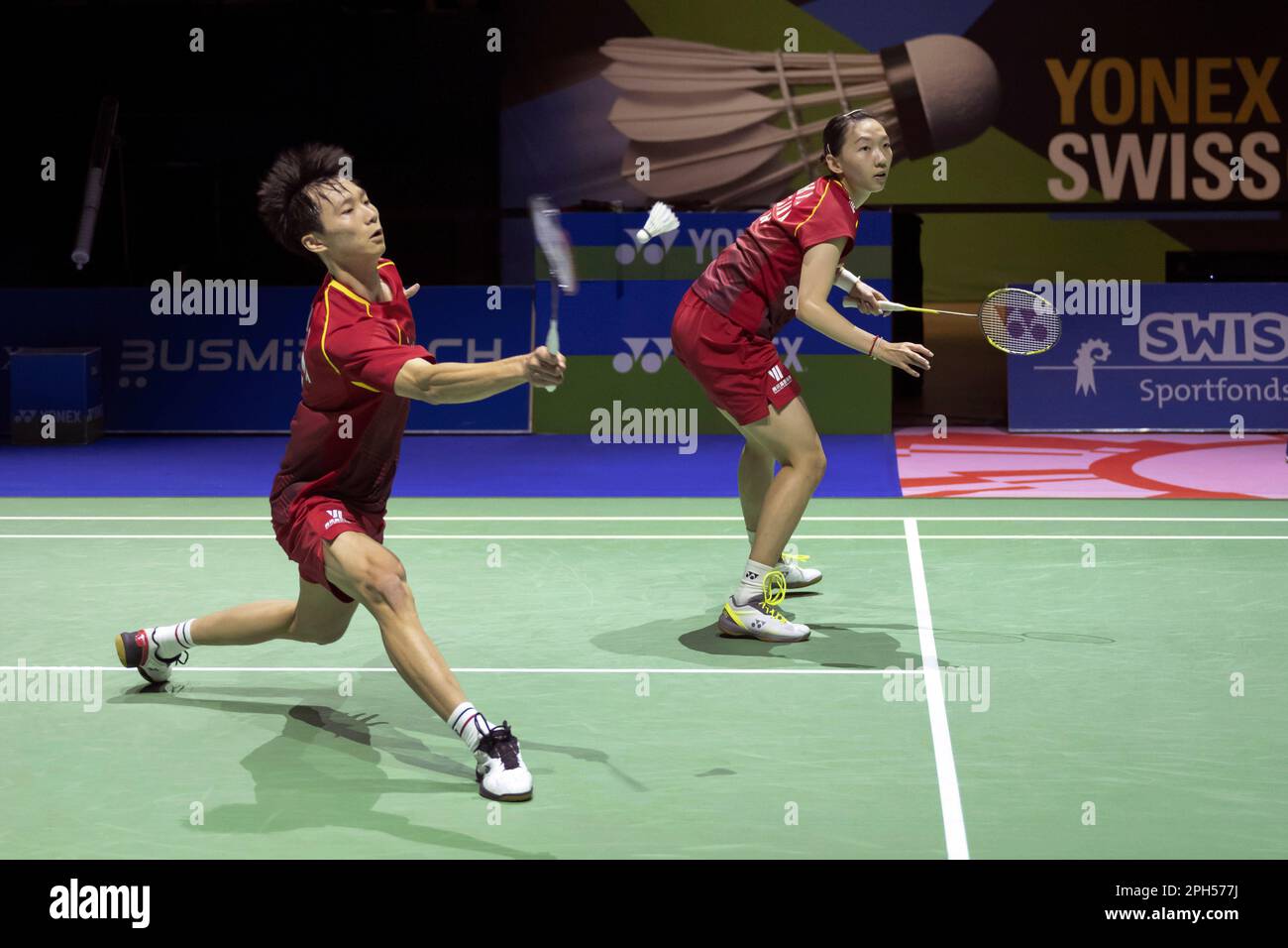 China's Zhen Bang Jiang, left, and Ya Xin Wei, return a shuttlecock to Malaysia's Soon Huat Goh ...