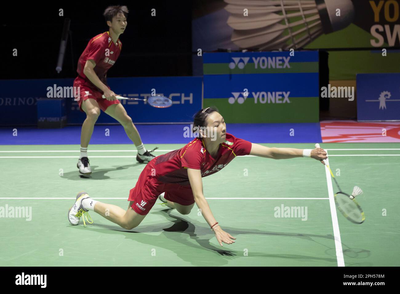China's Zhen Bang Jiang, left, and Ya Xin Wei, return a shuttlecock to Malaysia's Soon Huat Goh ...