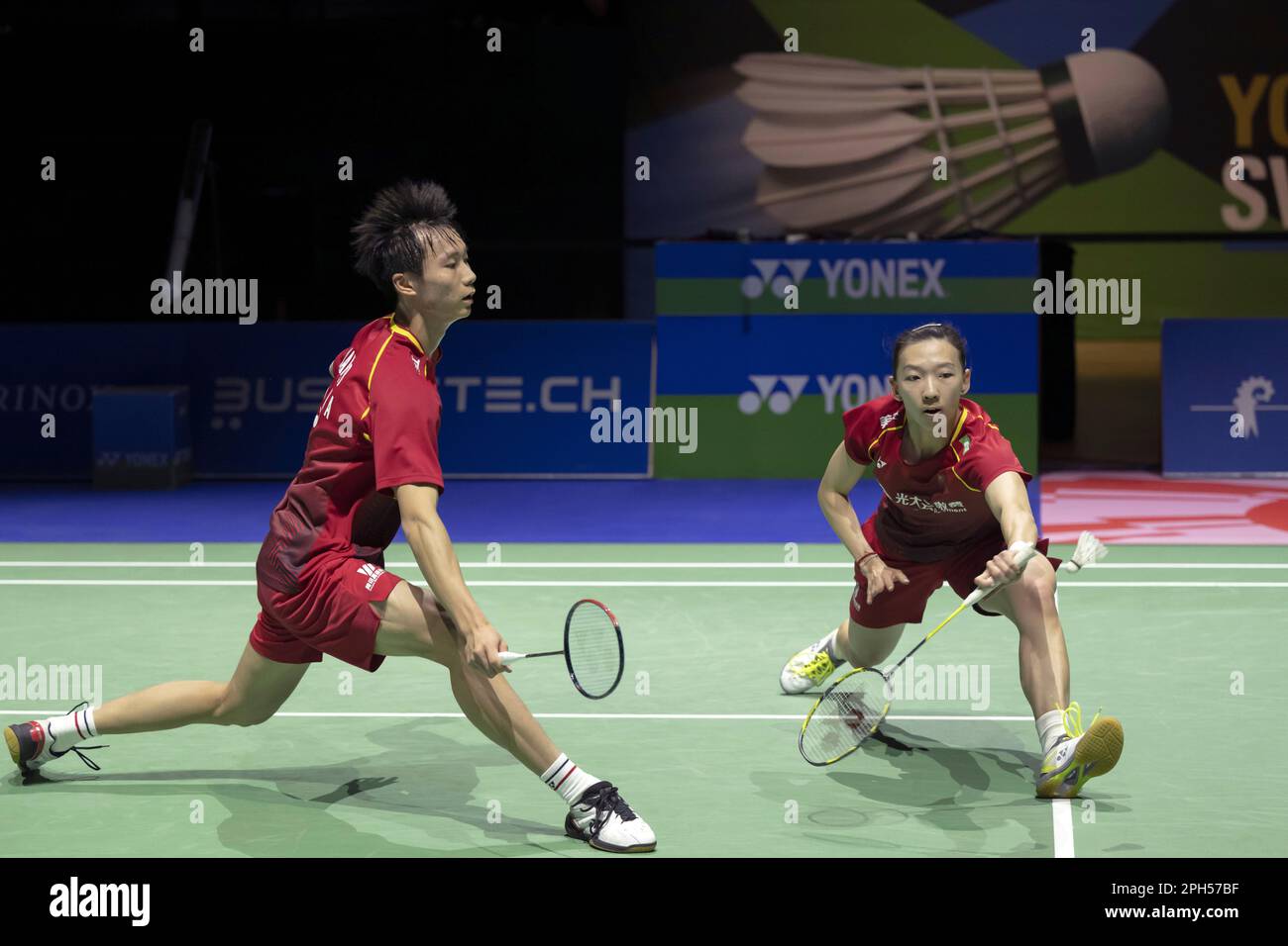 China's Zhen Bang Jiang, left, and Ya Xin Wei, return a shuttlecock to ...