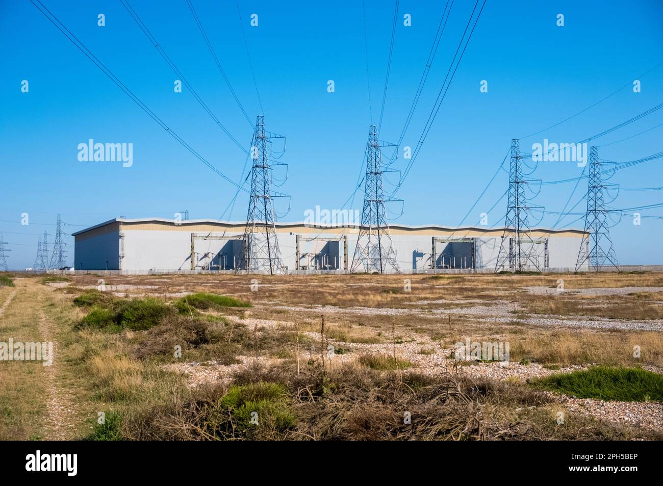 Pylons carrying electricity from the substation at Dungeness B nuclear ...