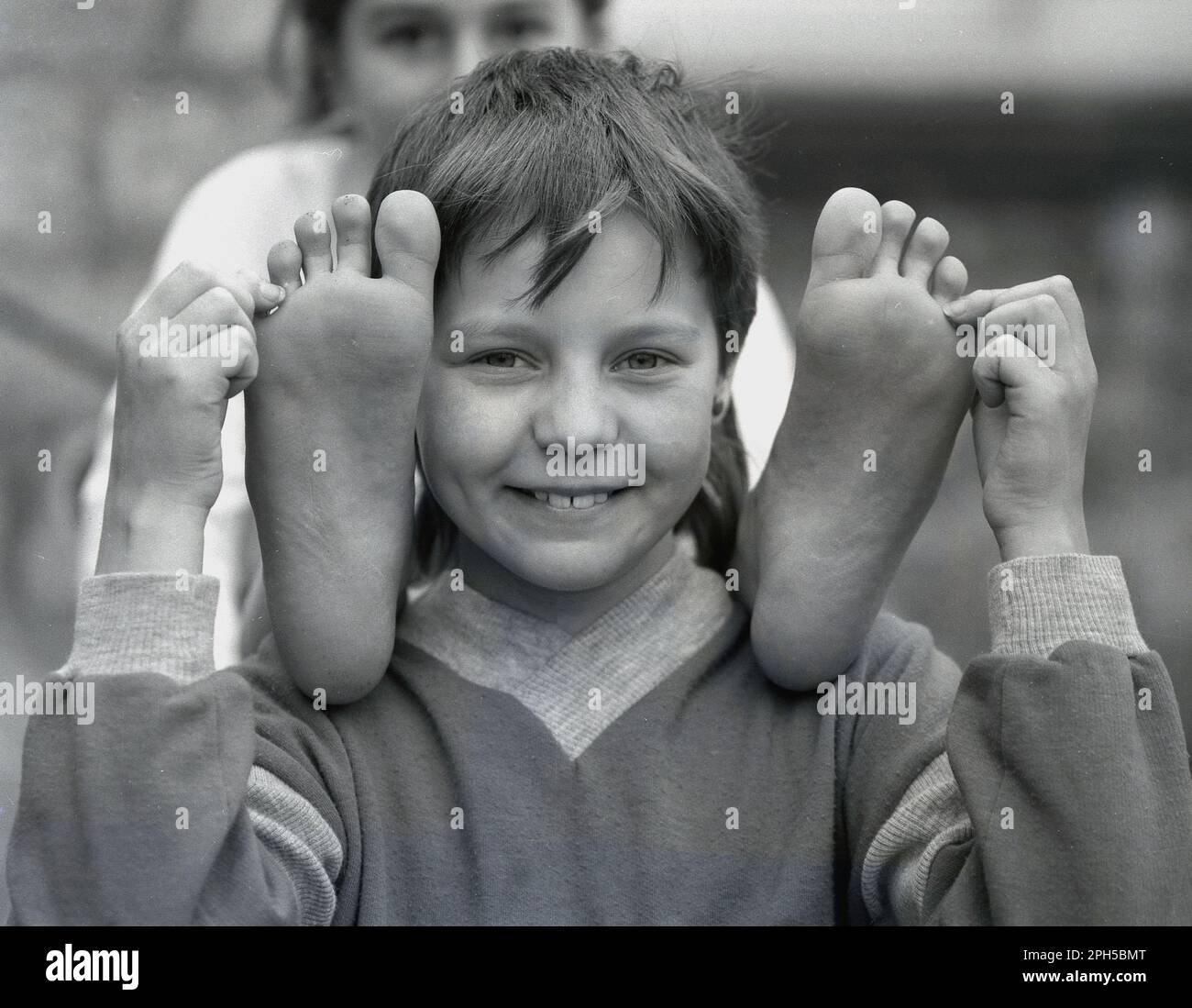 1986, school foot drawing competition, a young schoolgirl with her ...