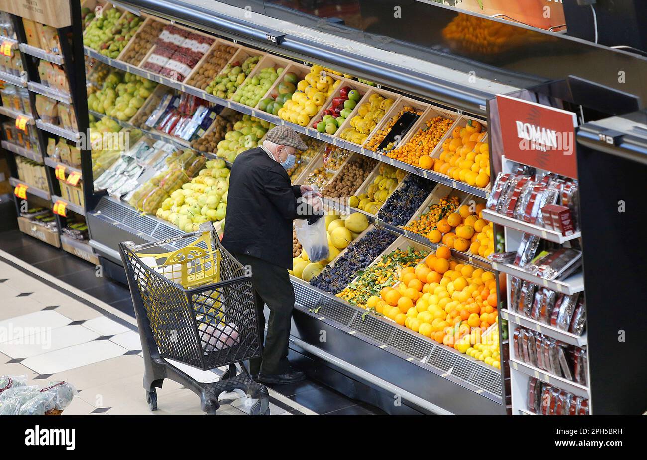 Beirut, Lebanon. 20th Mar, 2023. A man selects foodstuffs in a ...