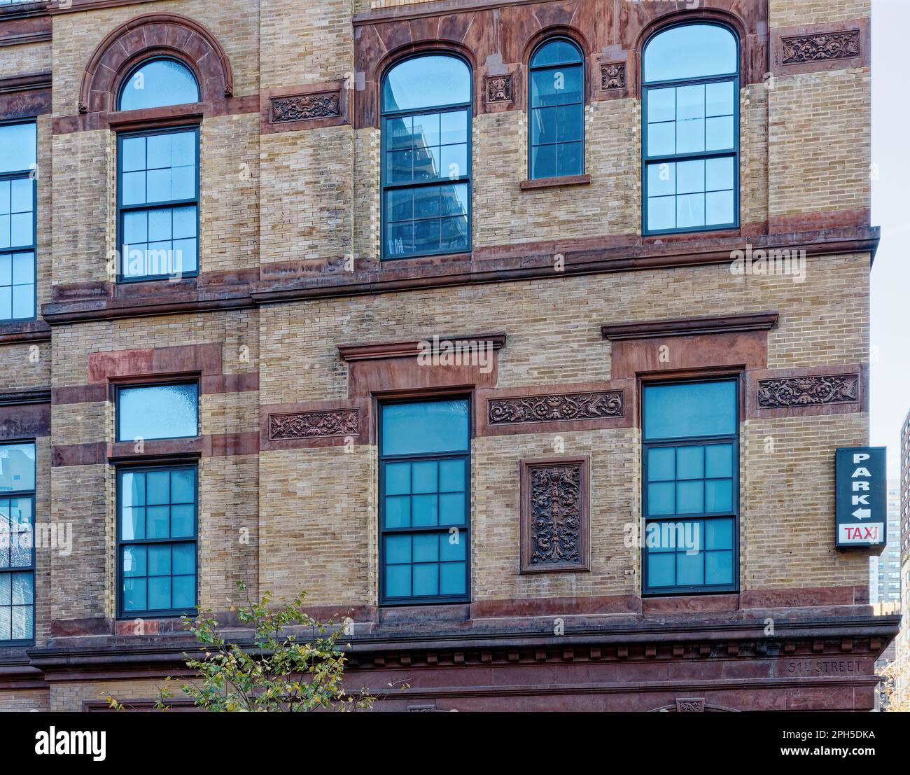 Beekman Regent detail. The Romanesque façade of NYC Public School 35 ...