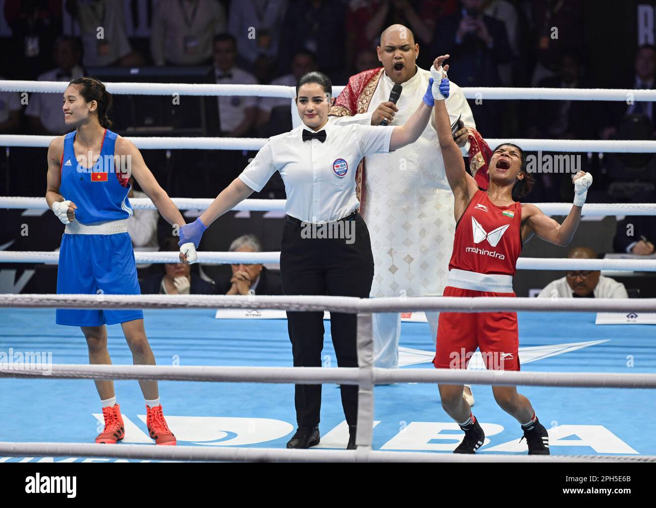 India's Nikhat Zareen, right, celebrates her win over Vietnam's Nguyen ...
