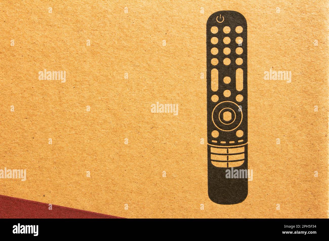Sign of a television remote in a cardboard box. TV remote symbol in a ...