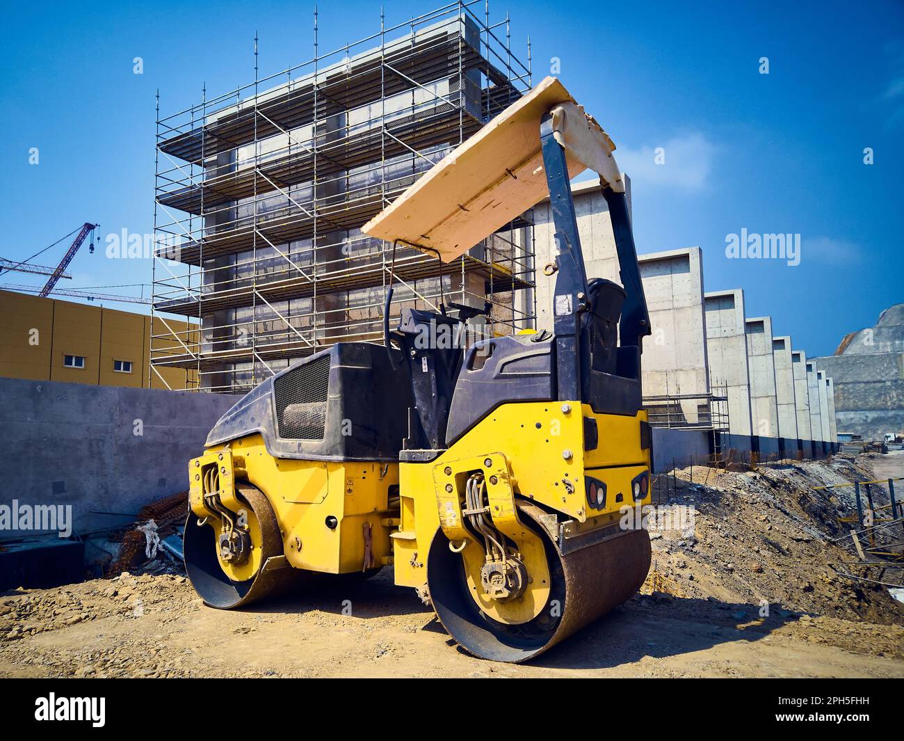 Road roller at construction site Stock Photo - Alamy