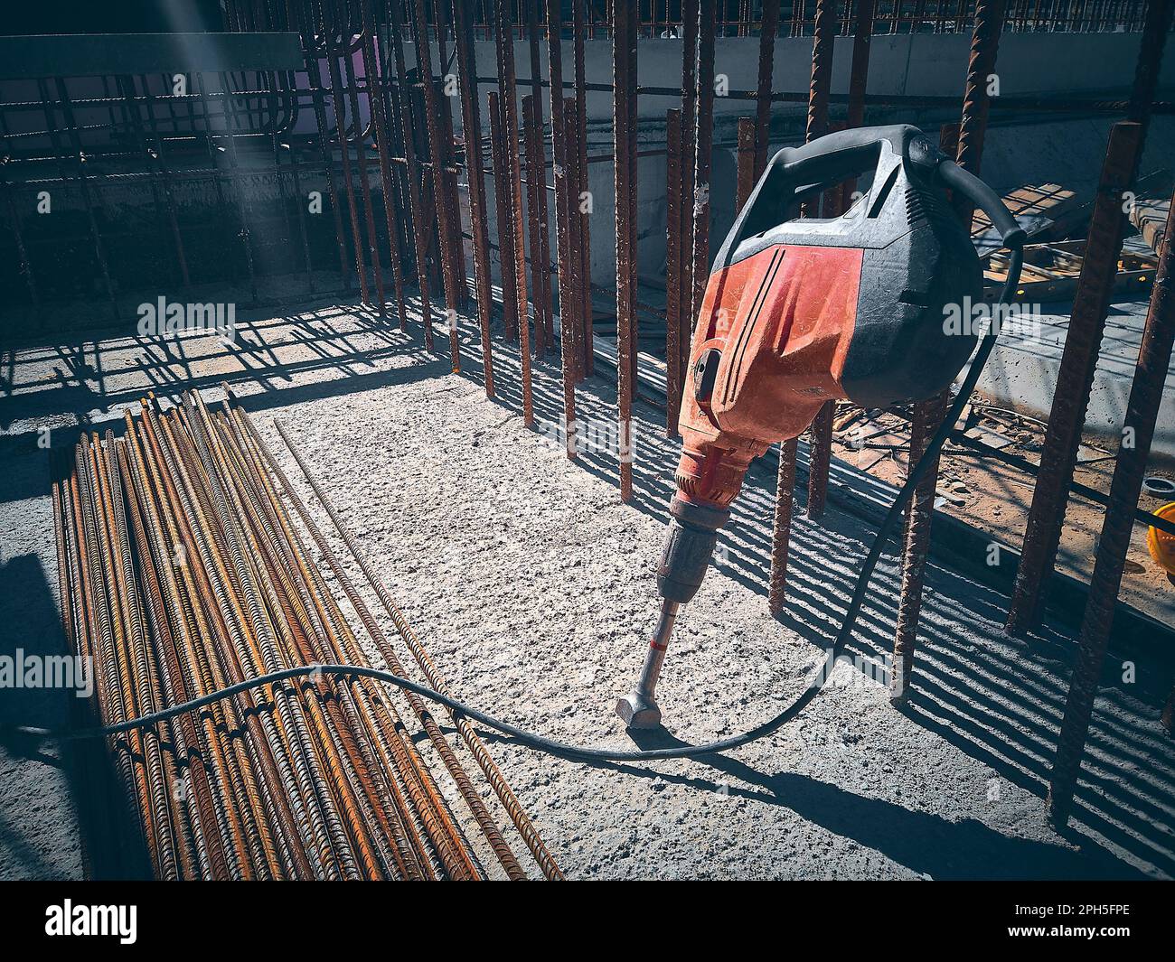 Bush hammer on construction site Stock Photo - Alamy