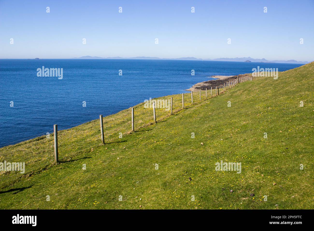 Walking along a sea cliff on the Northern edge of the Trotternish ...