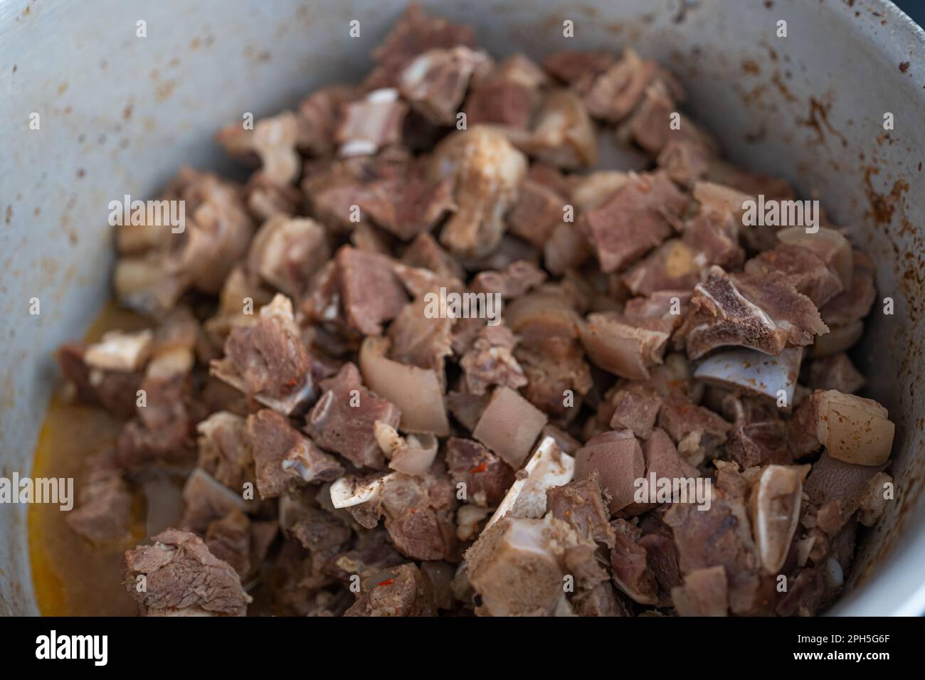 boiled goat meat in a pot ready to eat Stock Photo - Alamy