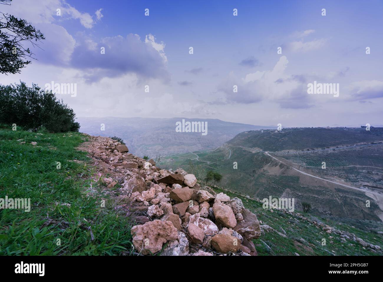 Stone wall towards mountain hi-res stock photography and images - Alamy