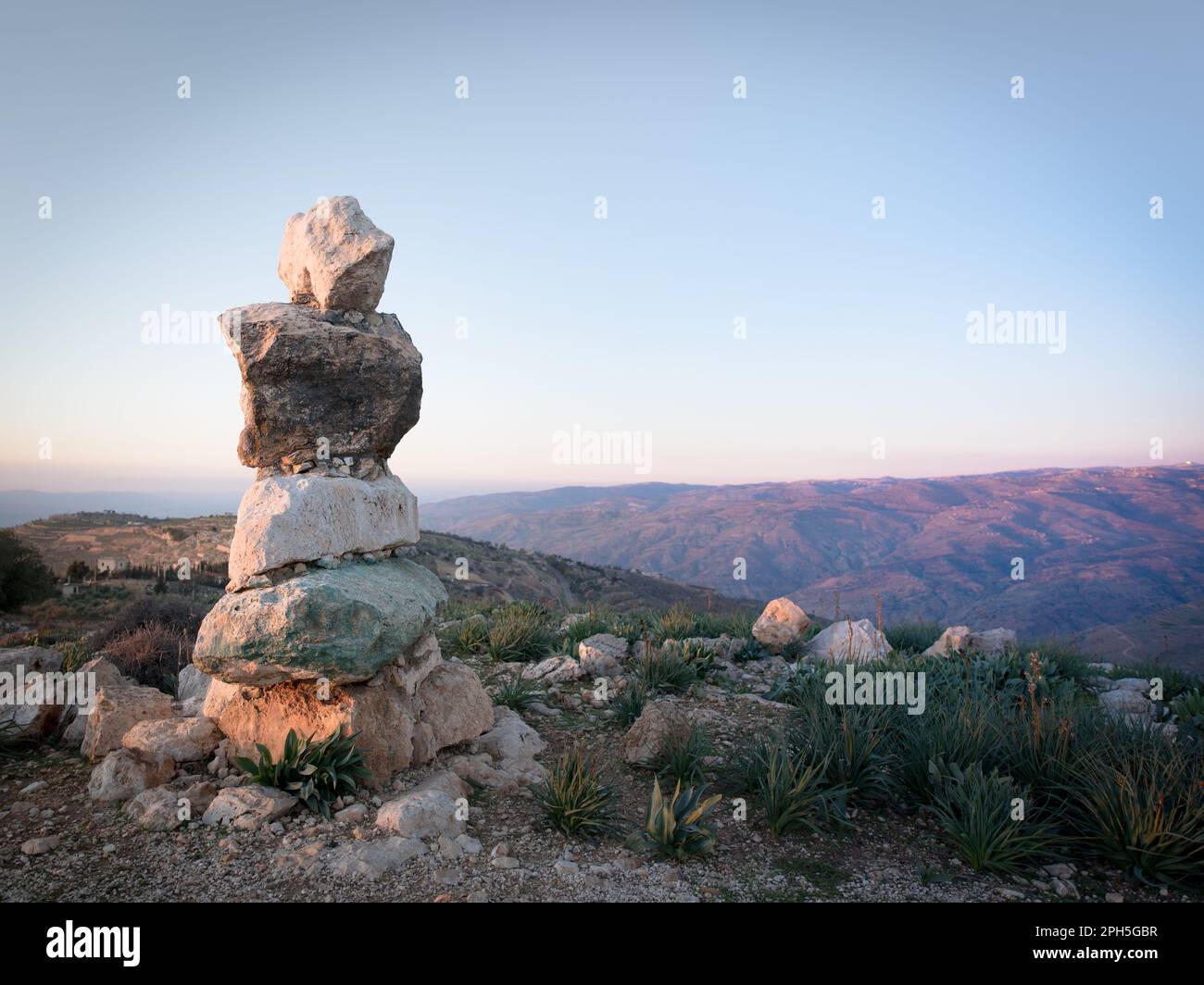 stone landmark statue made of balanced stone pieces at top of a ...