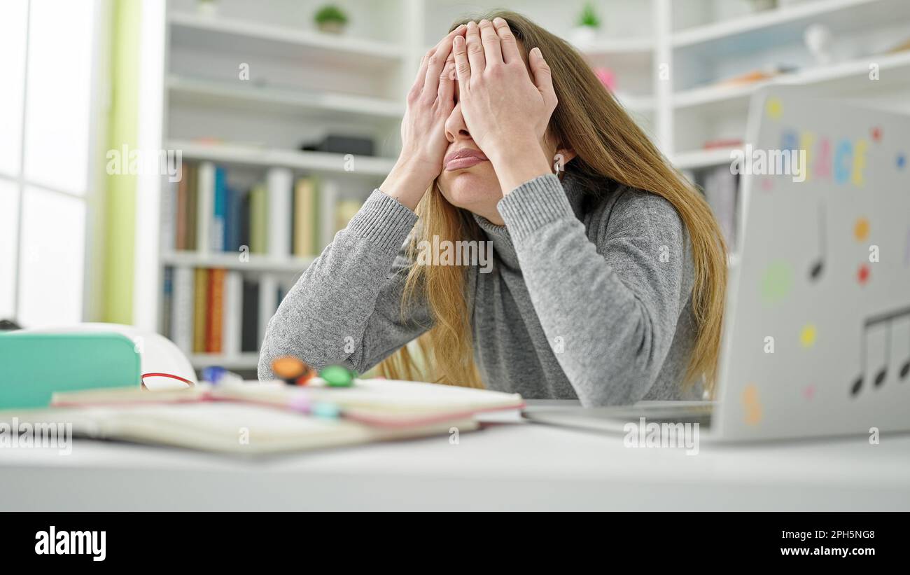 Exhausted student covering face hi-res stock photography and images - Alamy