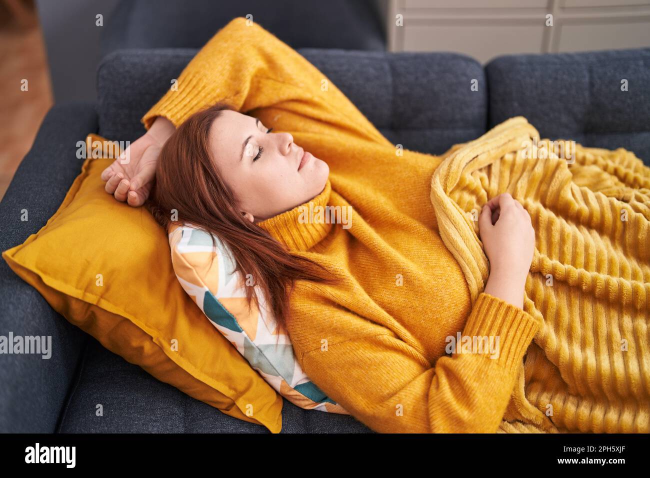 Overweight woman relaxing on sofa hi-res stock photography and images ...