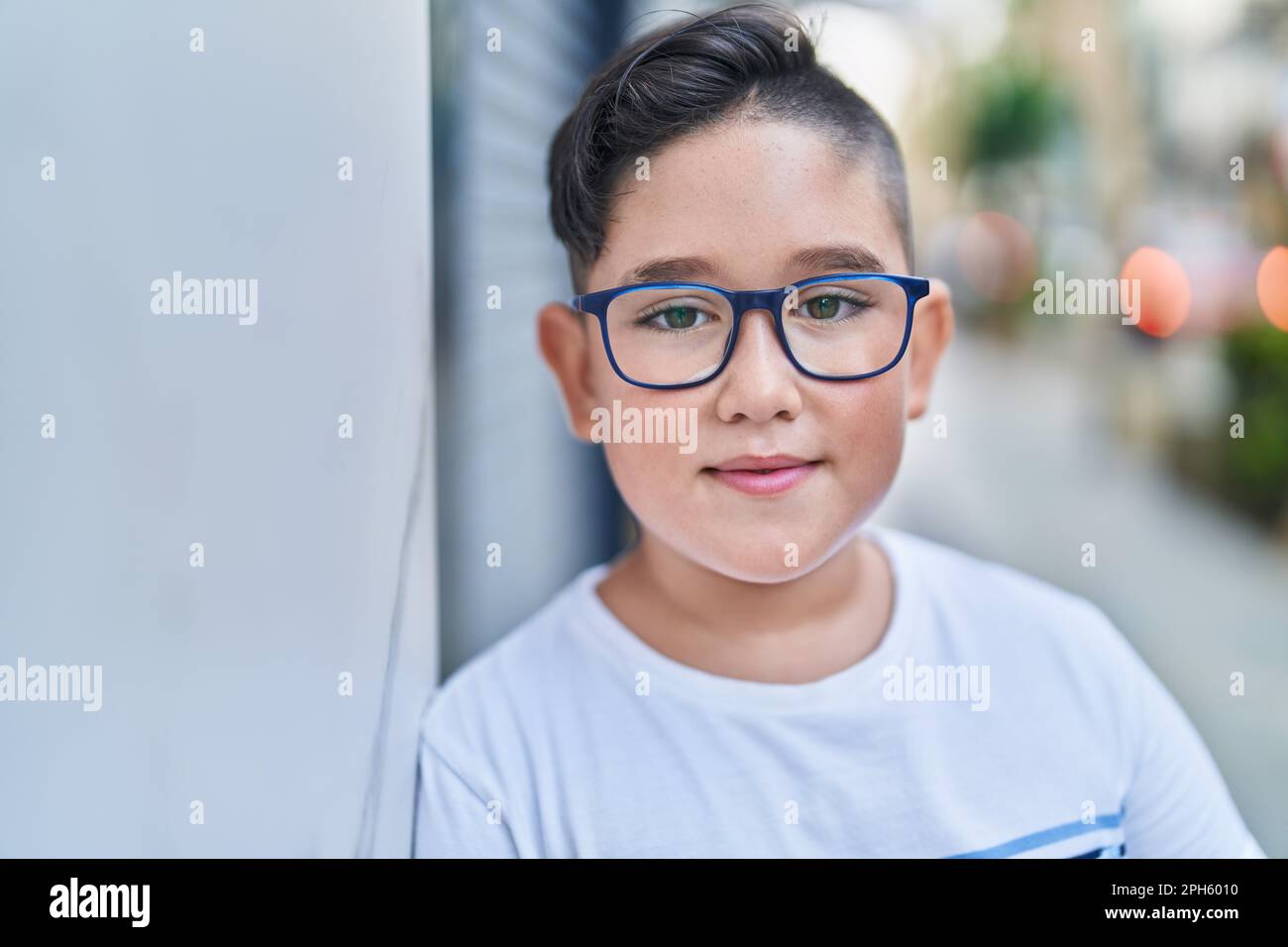 Adorable hispanic boy smiling confident standing at street Stock Photo ...