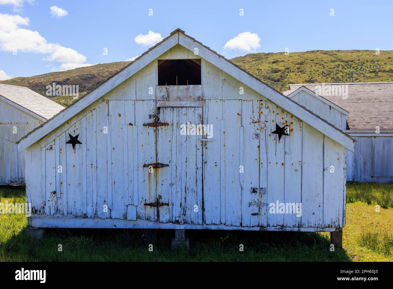 Rustic wooden storage shed painted white on historic Pierce Point Ranch ...