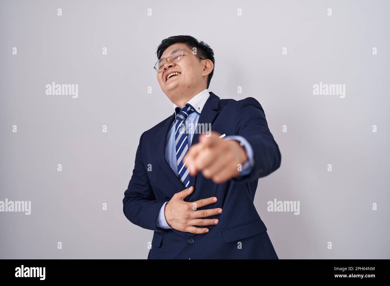 Positive korean male pointing finger hi-res stock photography and ...