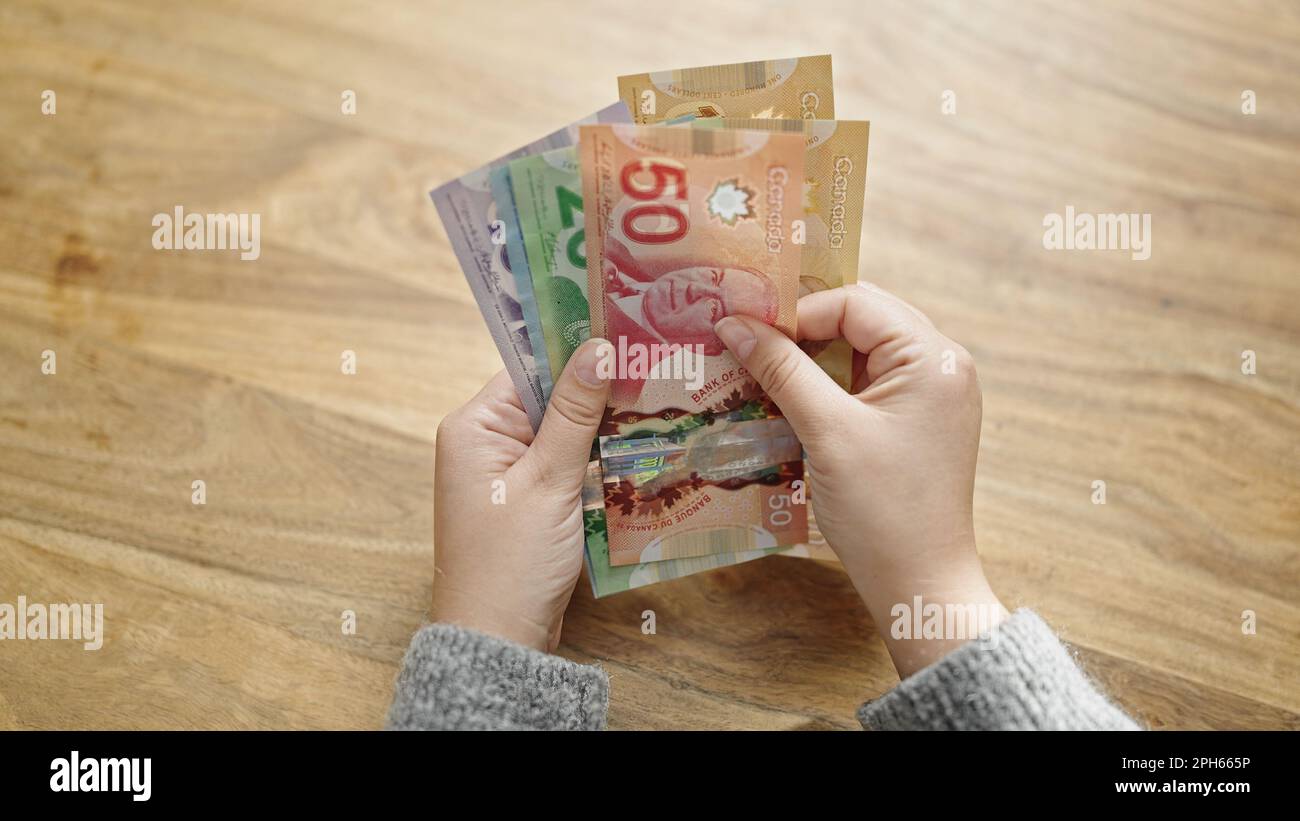 Canadian currency woman hi-res stock photography and images - Alamy