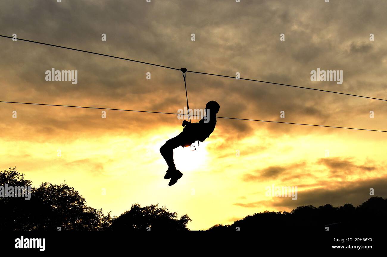 Guwahati, Guwahati, India. 24th Mar, 2023. A youth travel in Zip line ...