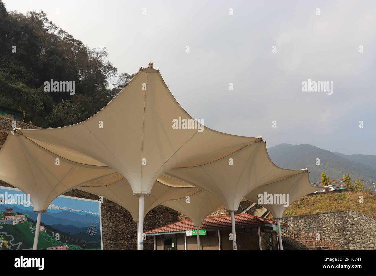 Eco friendly roof structure of sails created for shadow in mountain ...