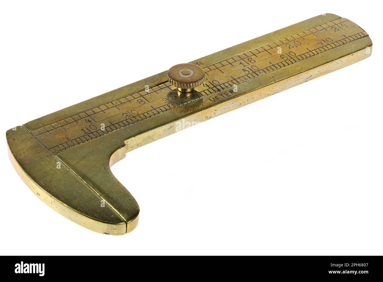 brass caliper isolated on white background Stock Photo - Alamy
