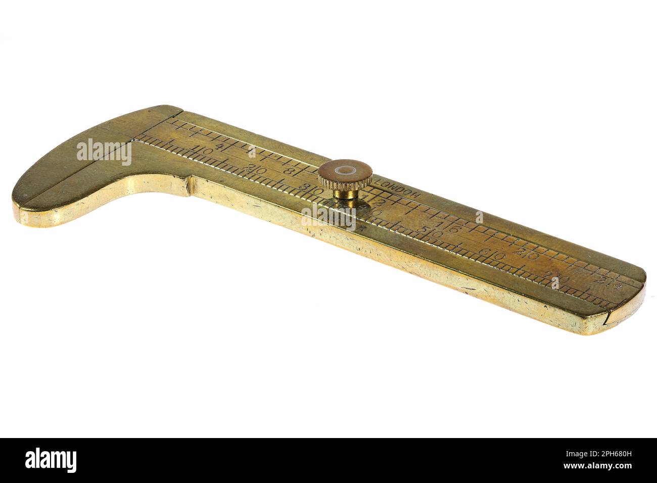brass caliper isolated on white background Stock Photo - Alamy