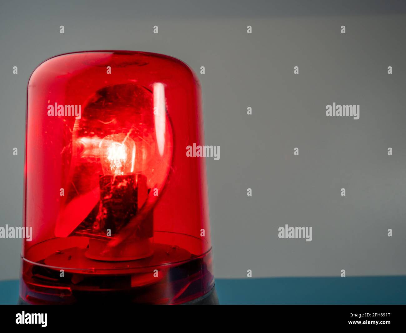 Red rotating beacon. Red flashing light. Warning signal. Close-up Stock Photo - Alamy