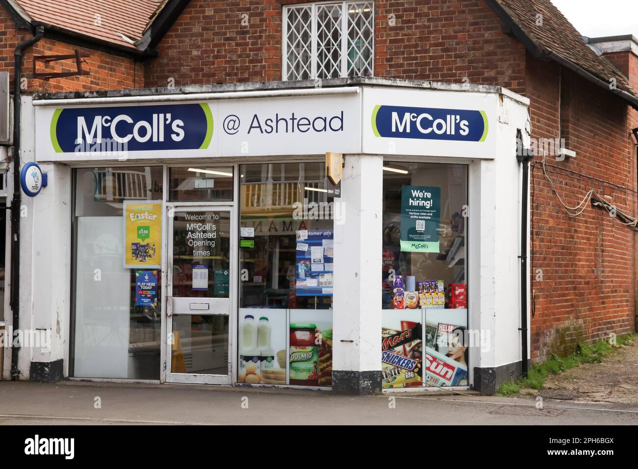 McColl's newsagent shop front on high street in Ashtead, Surrey ...
