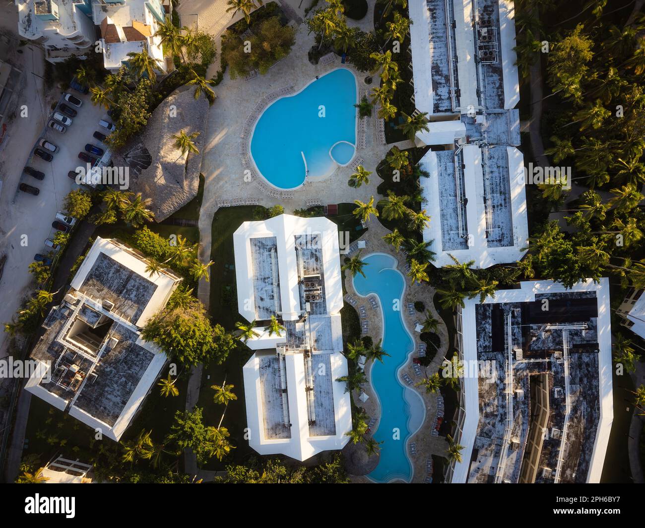 Hotel complex. View from above. Tall buildings, bungalows, palm trees ...