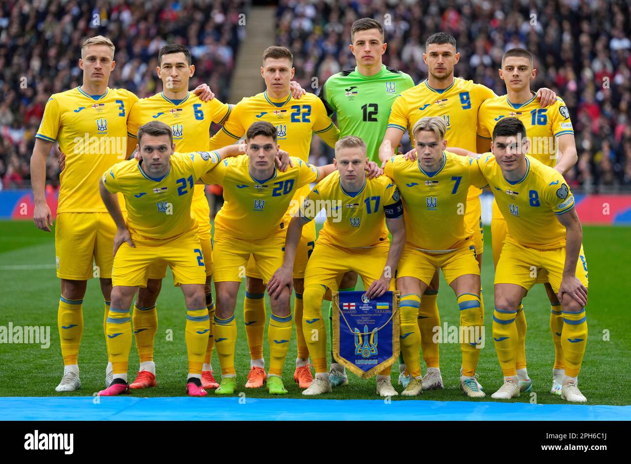 Ukraine starting players pose for a team photo at the beginning of the ...