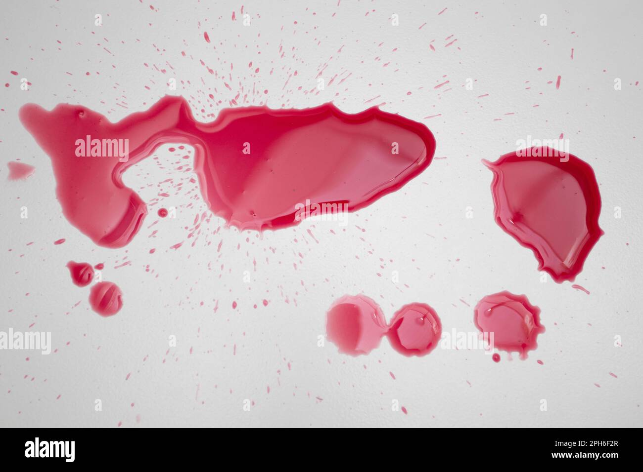 Drops of blood drip into the white background Stock Photo - Alamy