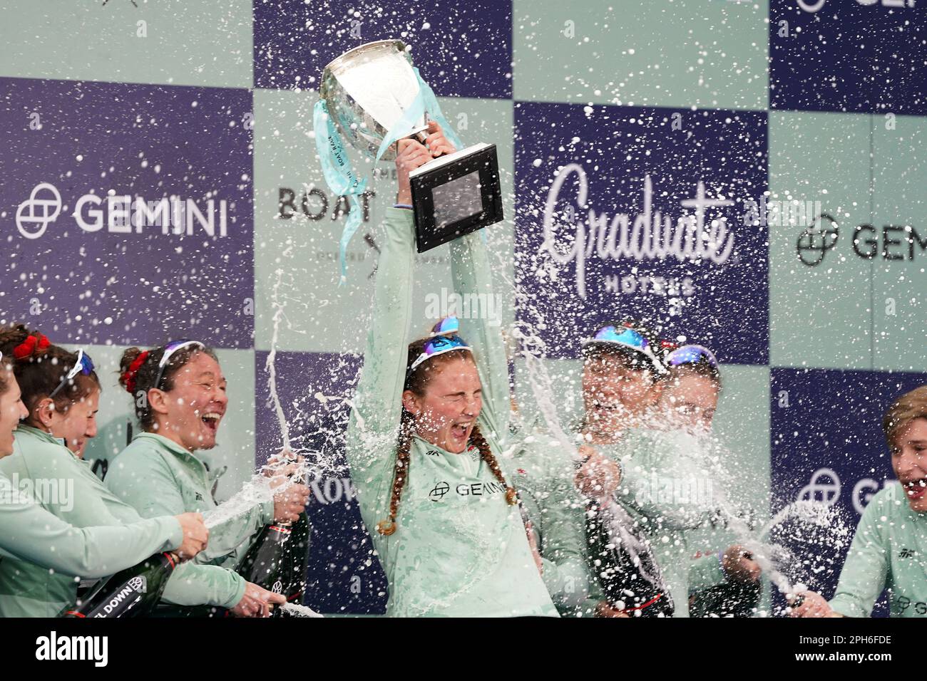 Cambridge's Caoimhe Dempsey lifts the trophy after the 168th Gemini ...