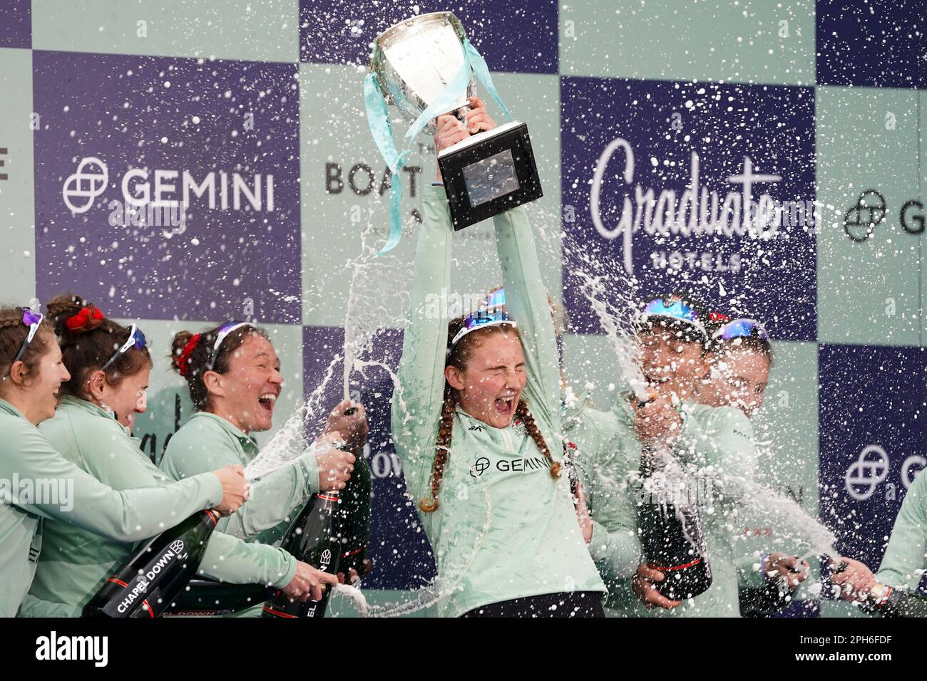 Cambridge's Caoimhe Dempsey lifts the trophy after the 168th Gemini ...