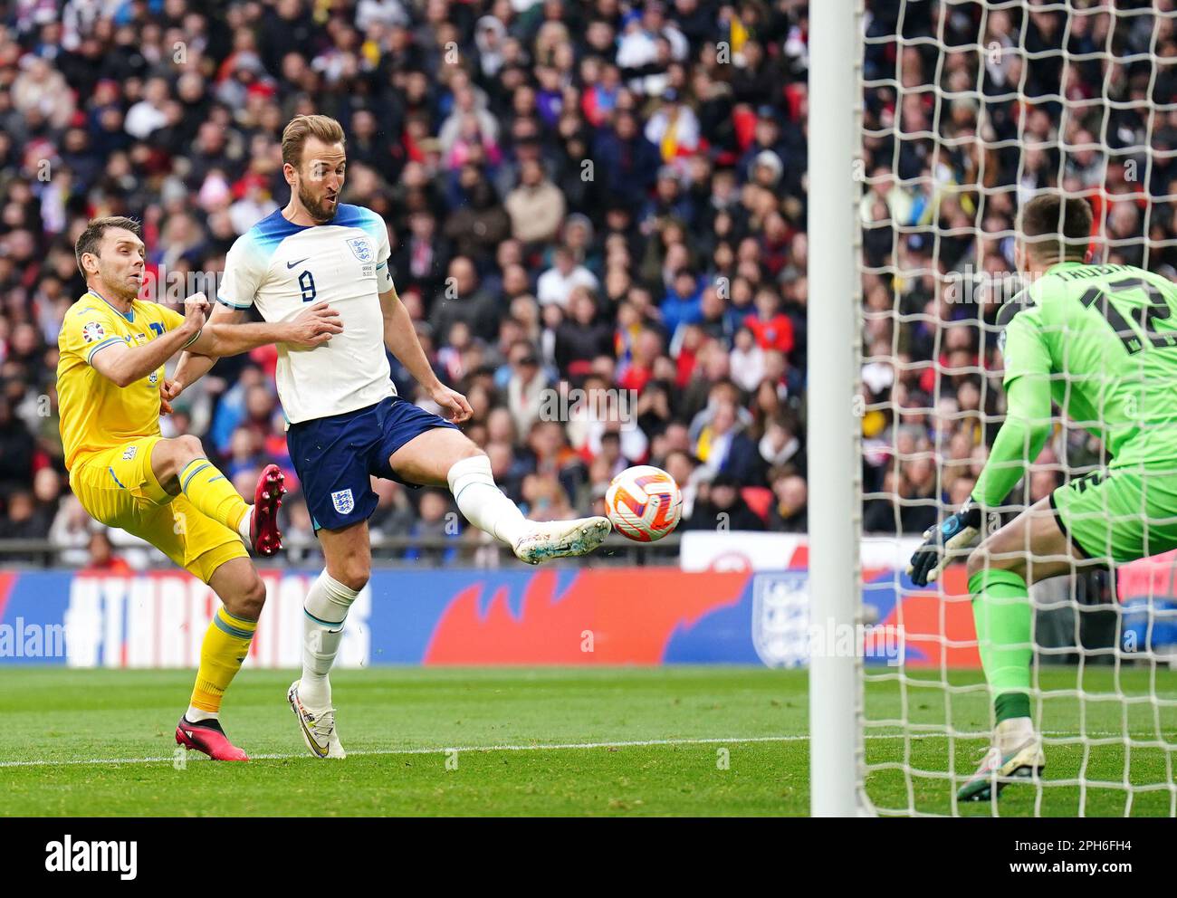 England's Harry Kane scores their side's first goal of the game during ...