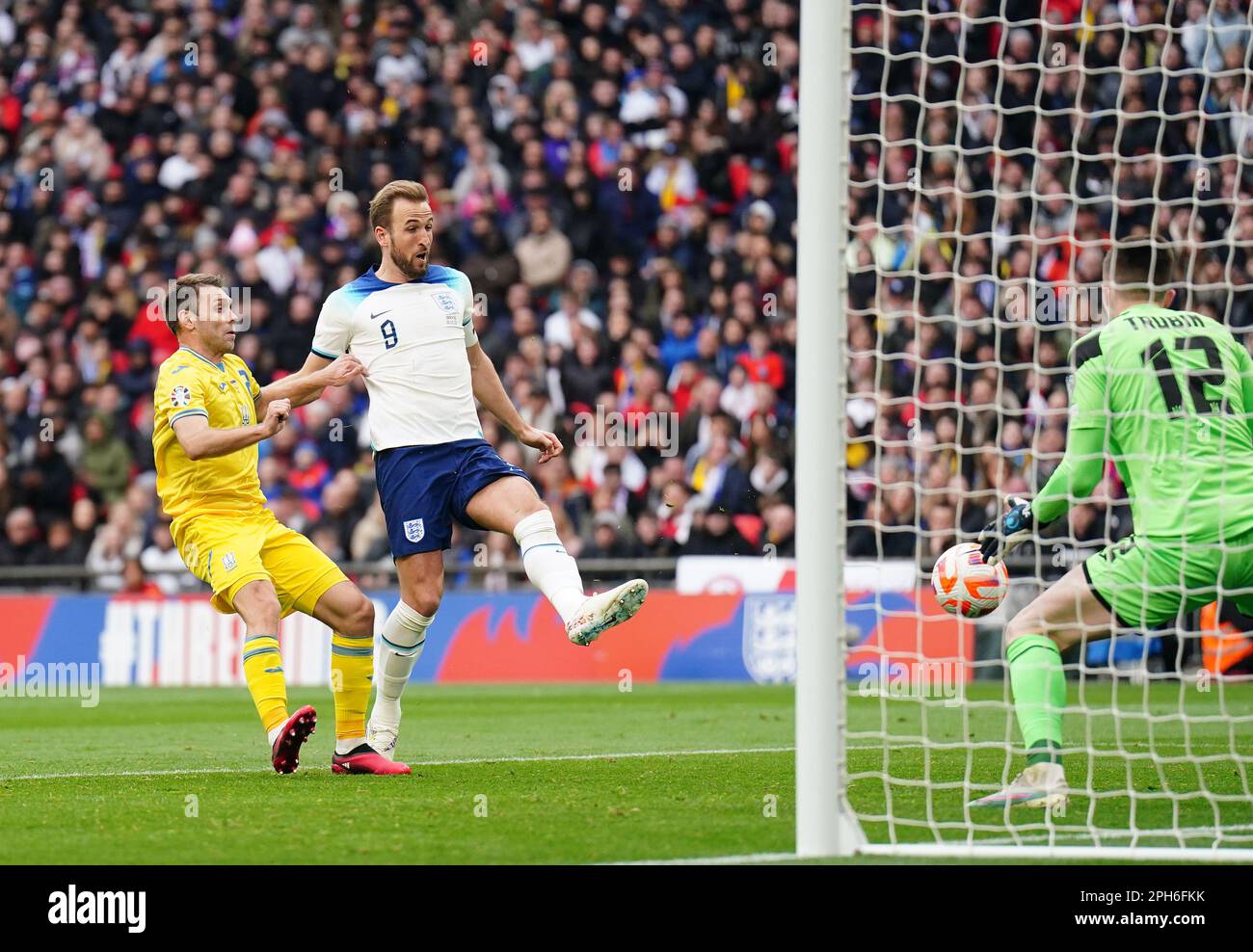 England's Harry Kane scores their side's first goal of the game during ...