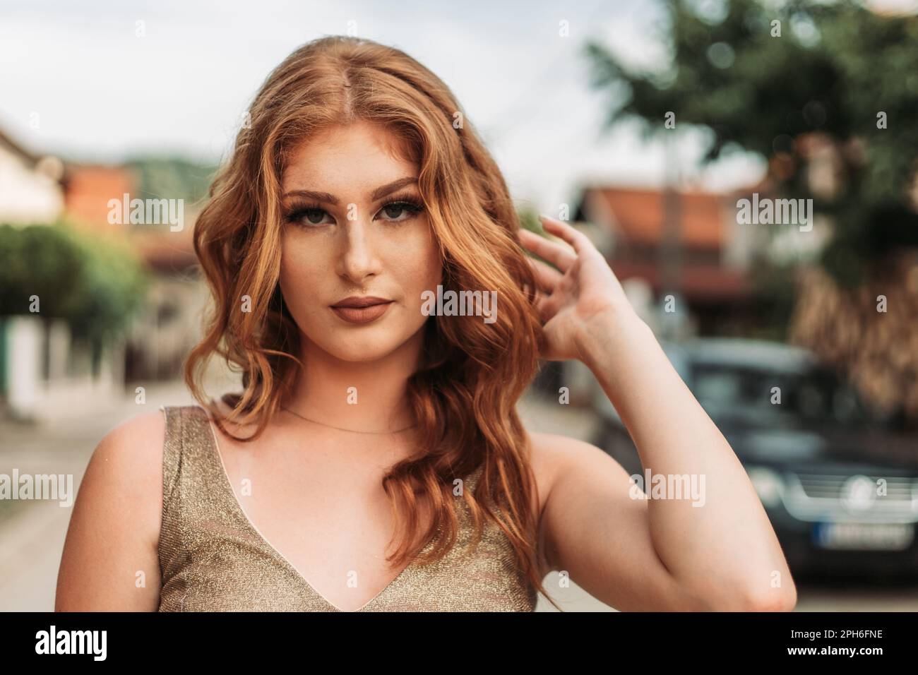 Beautiful Ginger Teen Girl In Glamorous Golden Dress Ready For Her