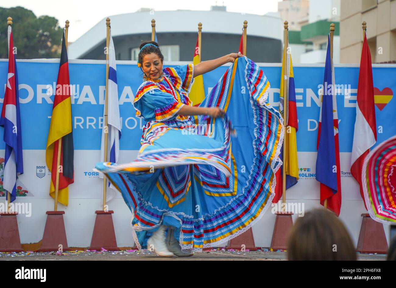 Torremolinos. Woman performing traditional South American dance, dia ...