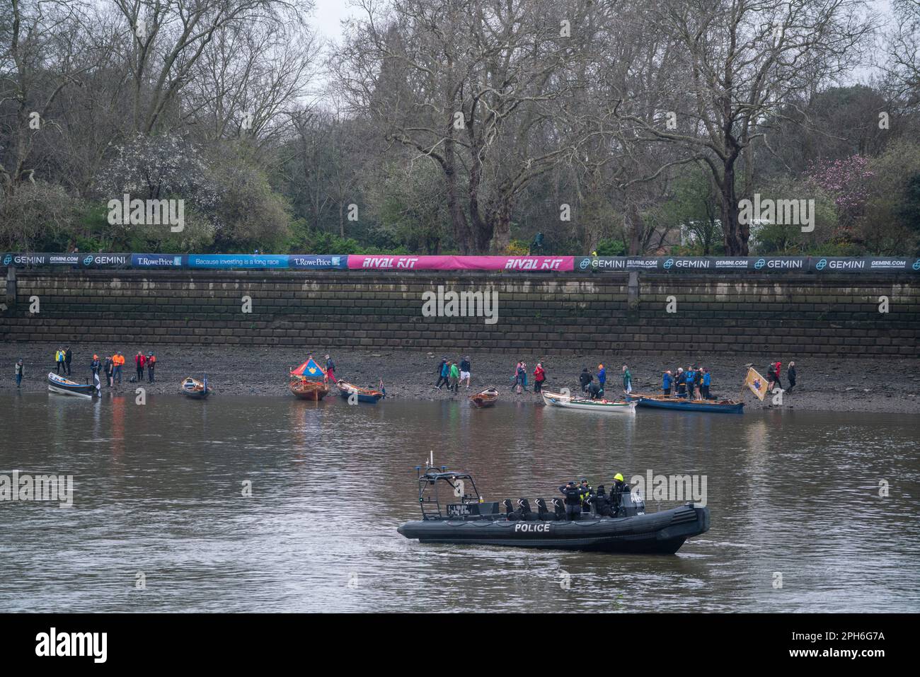 London UK 26 March 2023. A police dinghy patrols the River Thanmes ...