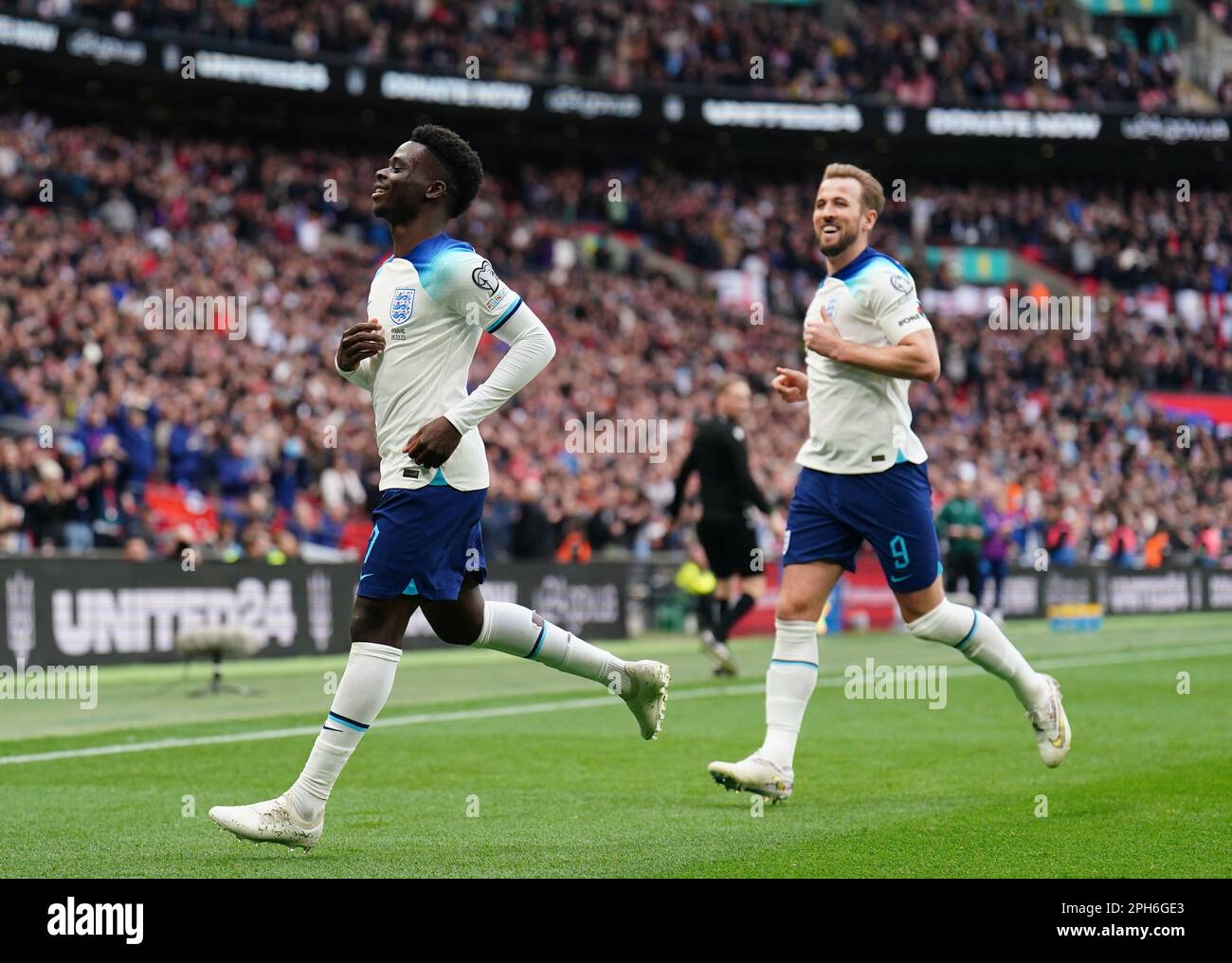 England's Bukayo Saka celebrates scoring their side's second goal of ...