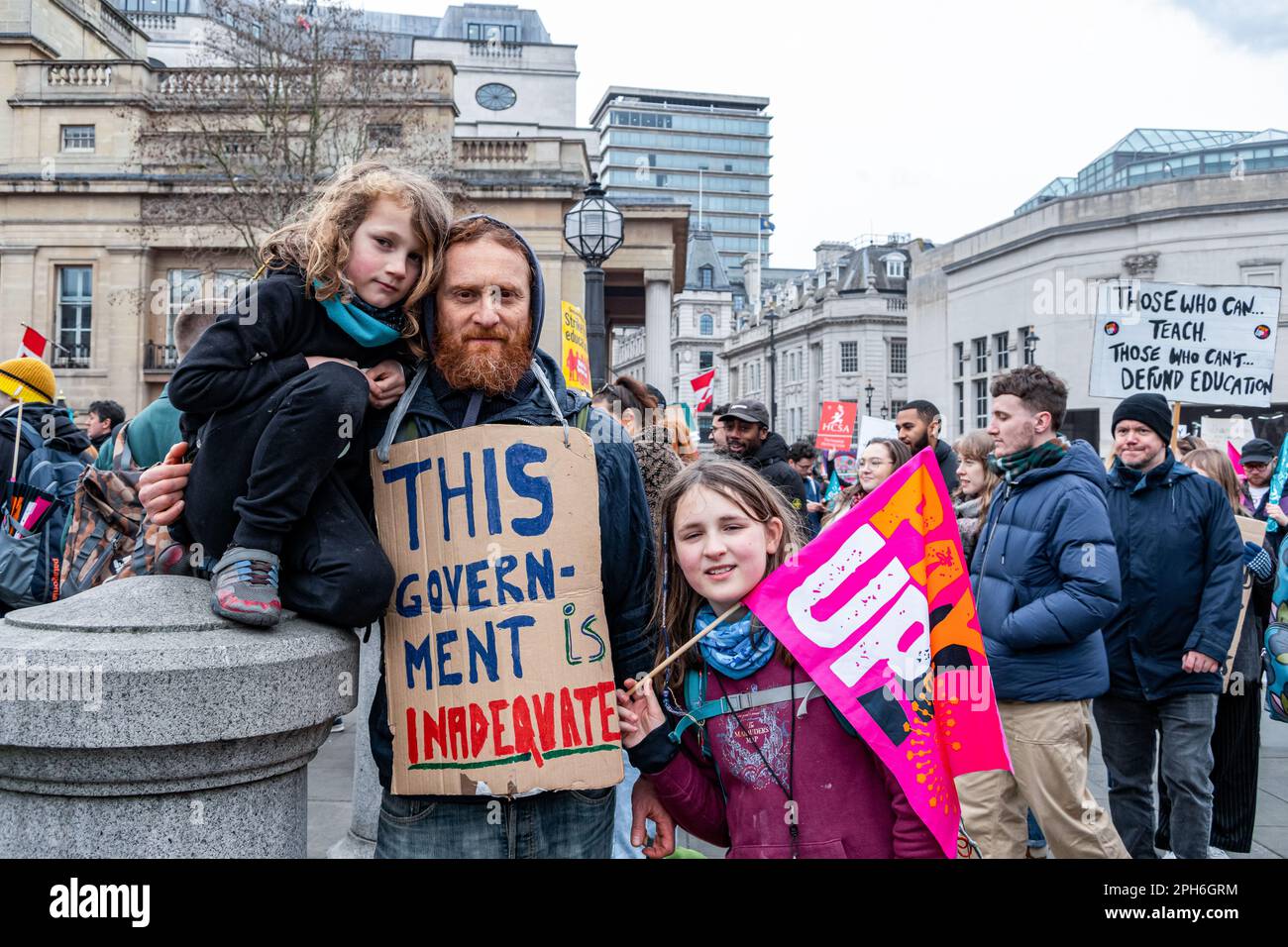 London, UK. 15th March, 2023. Father with children protesting at the ...