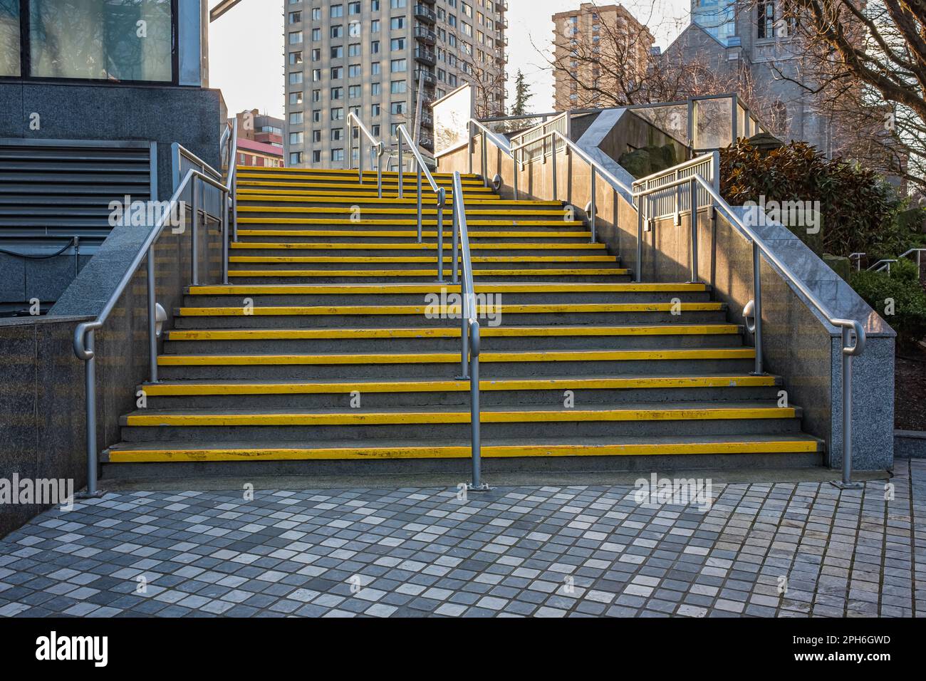 Abstract stairs with metal railings in the city. Abstract steps, cement ...