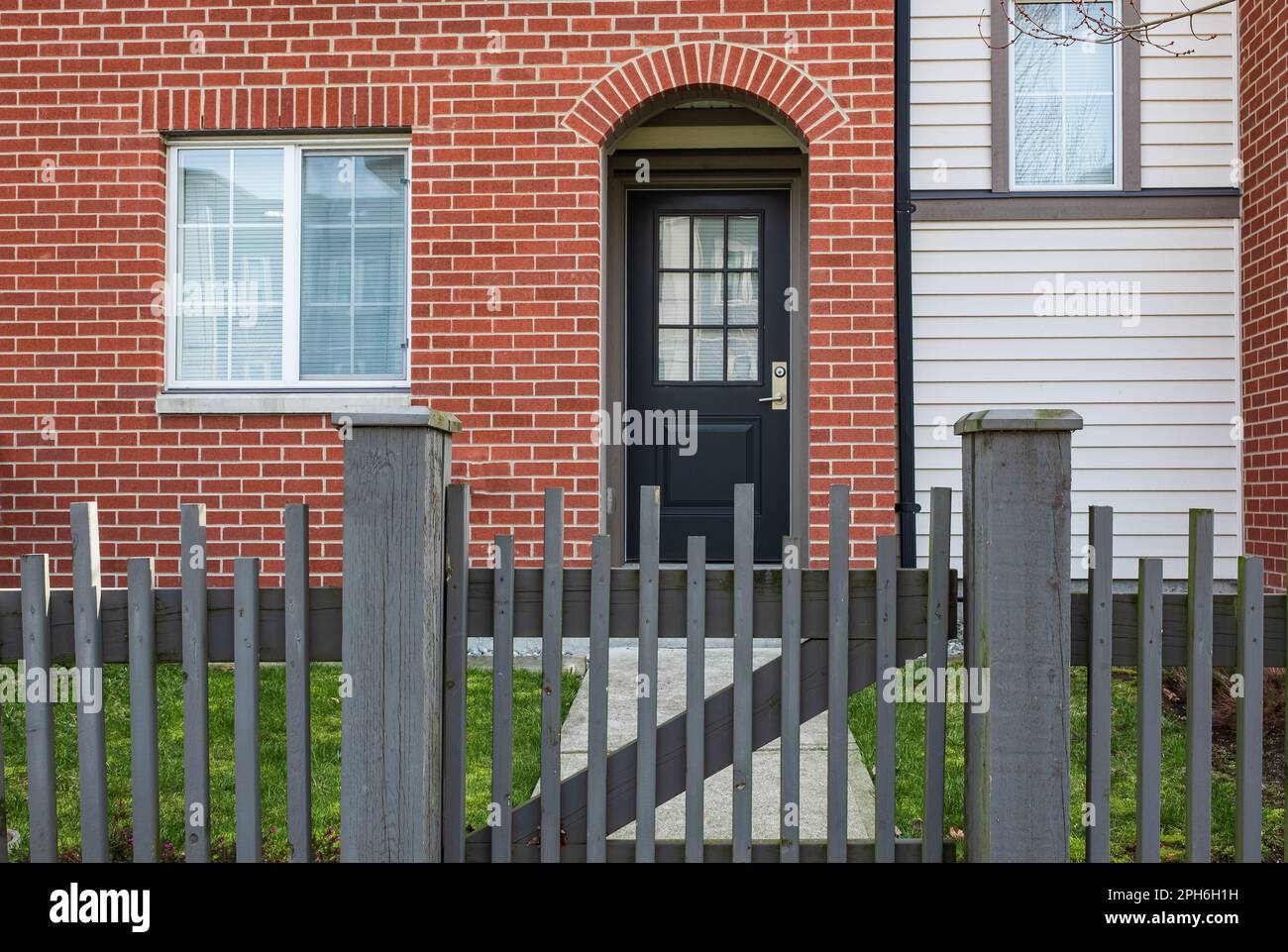 Apartment house, residential building complex with gate. New Suburban ...