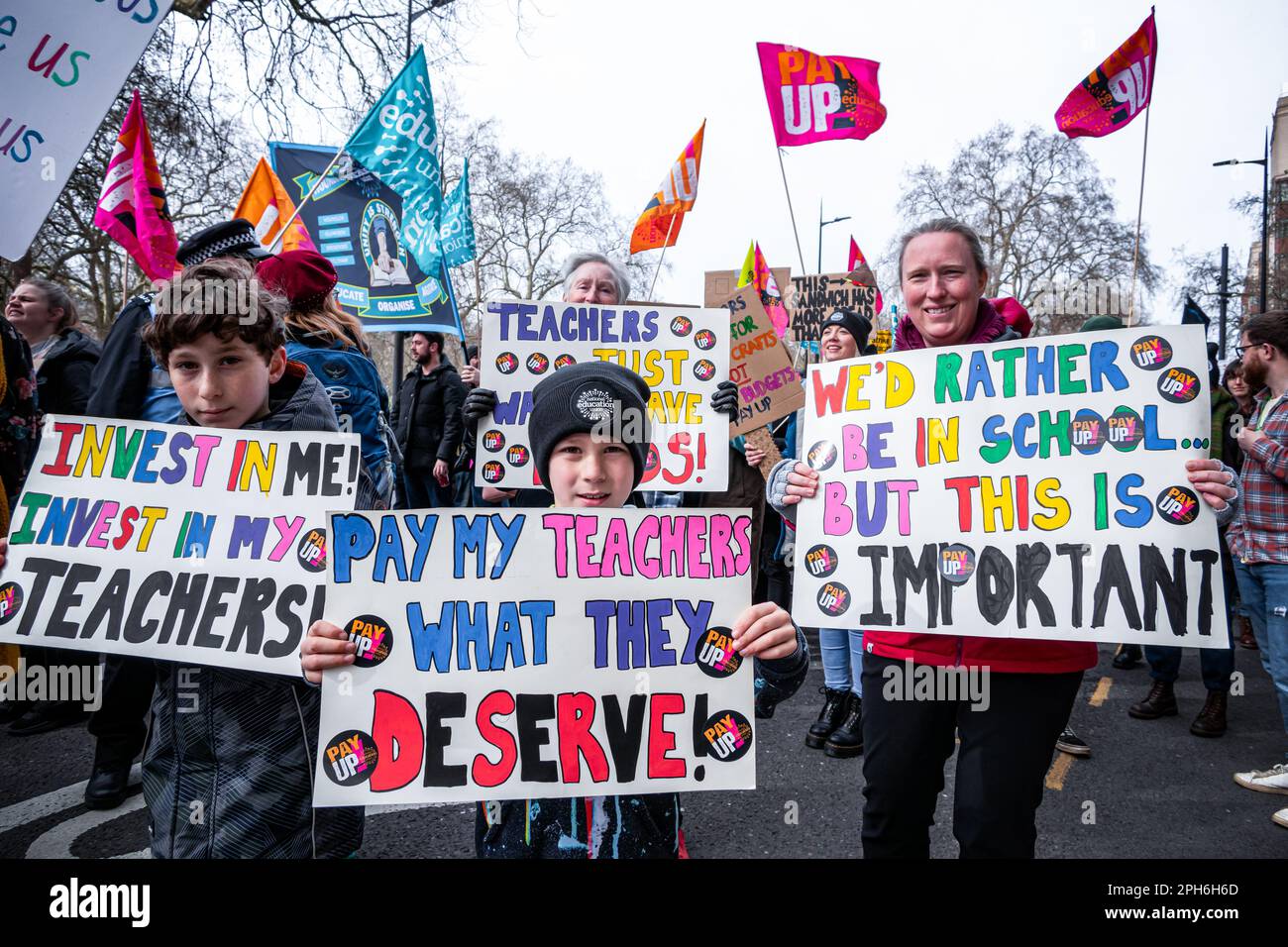 London, UK. 15th March, 2023. Teachers and children line up at the ...