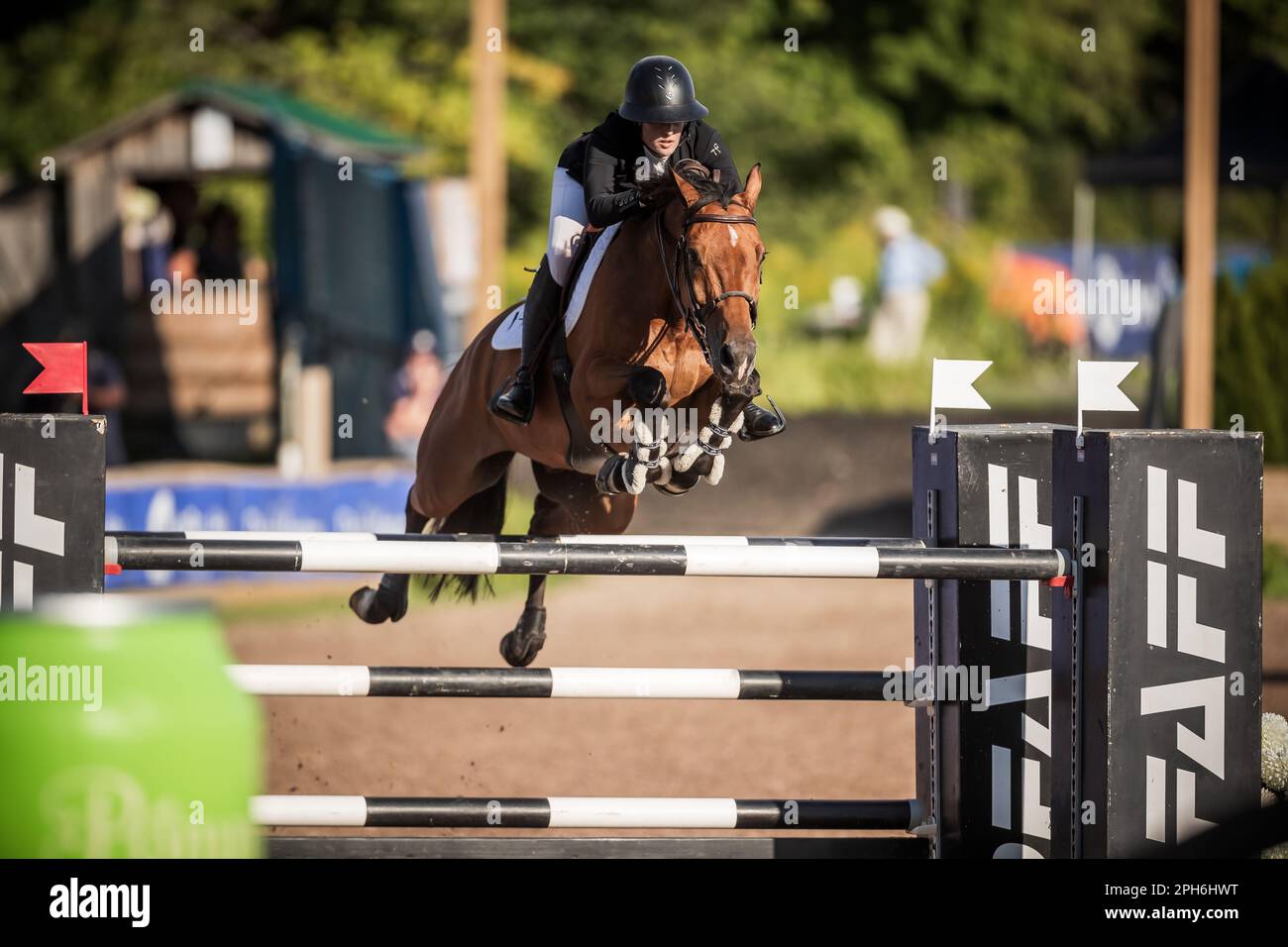 A professional rider competes during the 2022 Major League Show Jumping ...