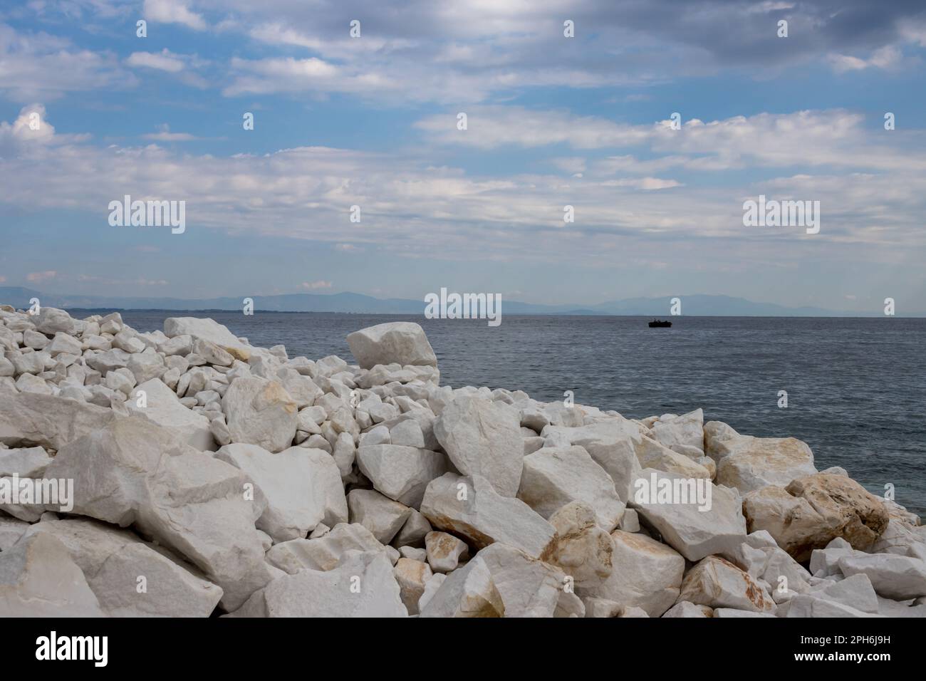 White marble lining the coast of Thracian sea. Marble beach in white ...