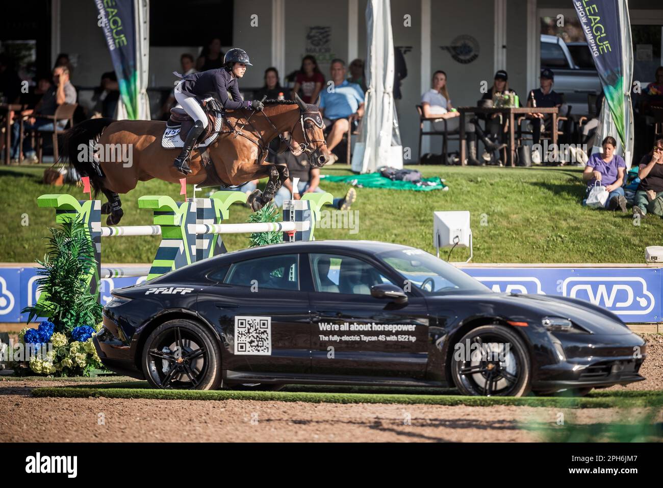A rider competes during the international Major League Show Jumping ...
